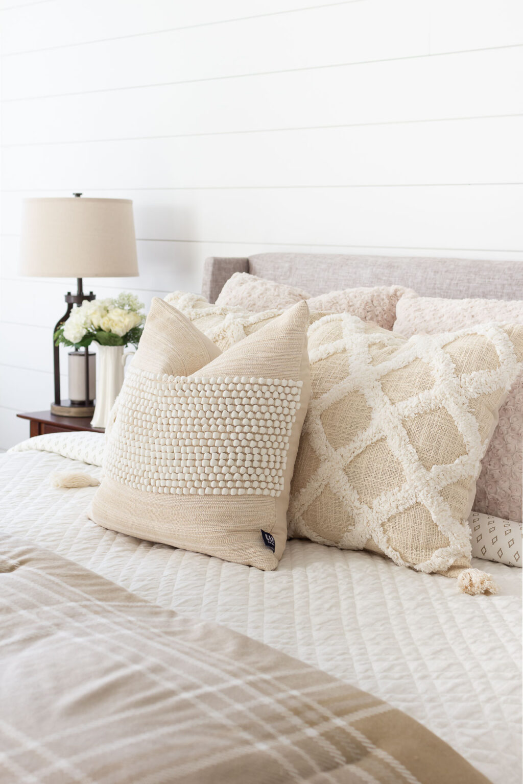 Adding Interest to Layered Neutral Bedding - On Sutton Place