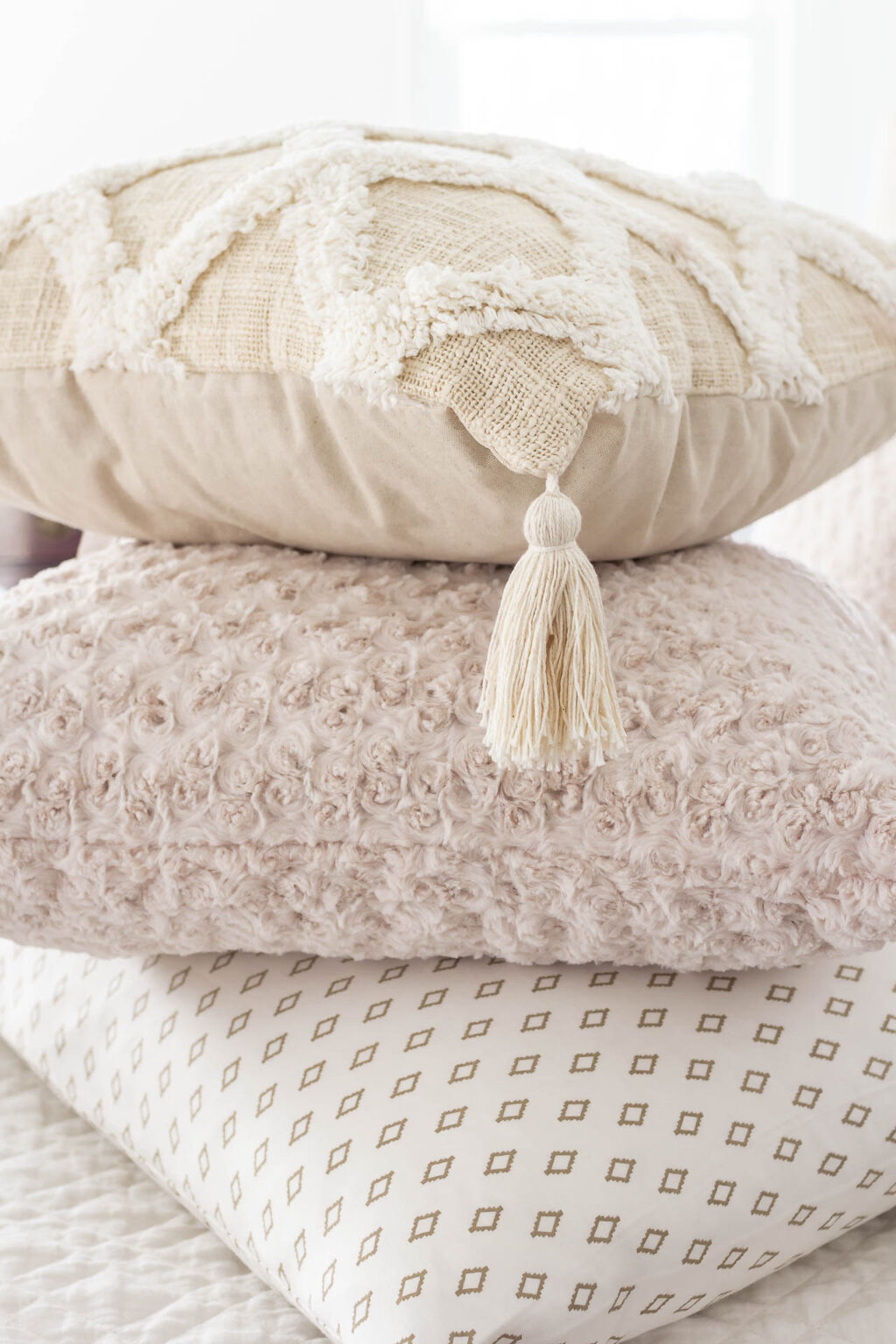 Adding Interest to Layered Neutral Bedding - On Sutton Place